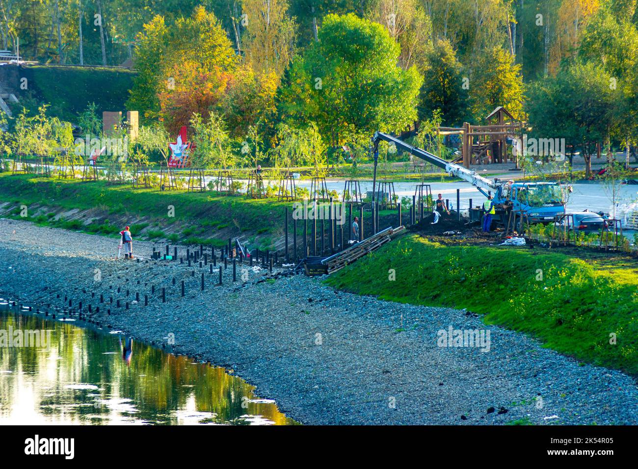 construction work to strengthen the shore and arrange the pier with ...
