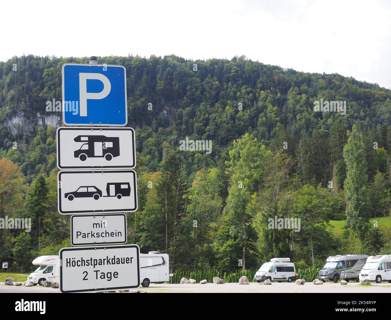 A road signs in German in background of mountains Stock Photo - Alamy