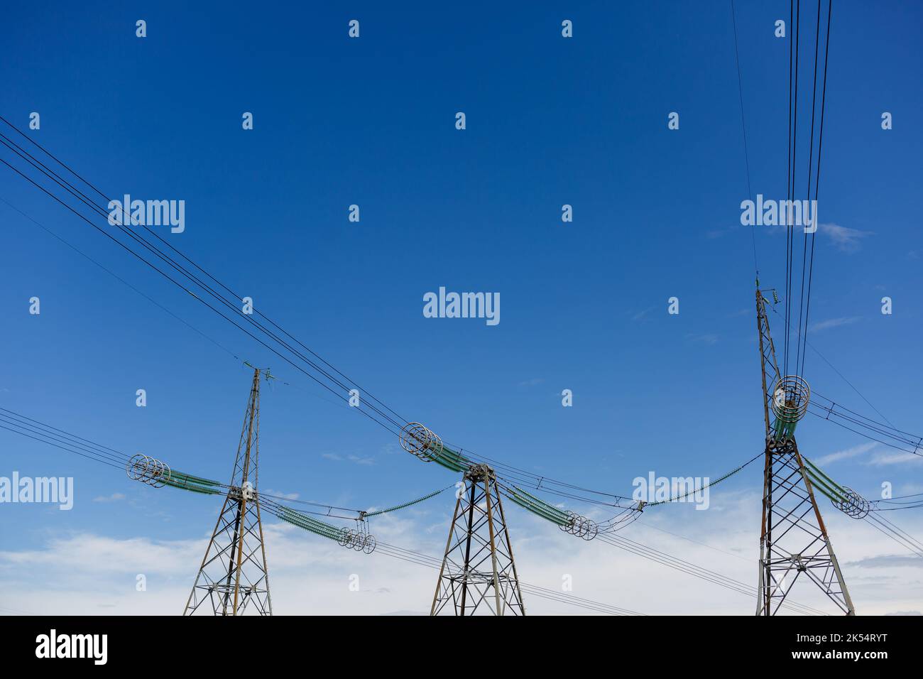 Power lines and high-voltage lines against the backdrop on a sky a ...