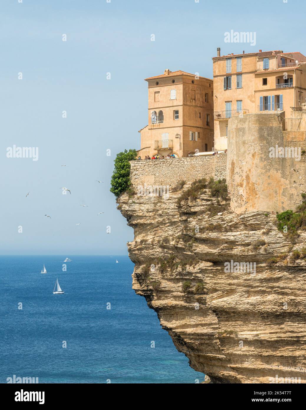 The city of Bonifacio perched on its scenographic cliffs on a sunny ...