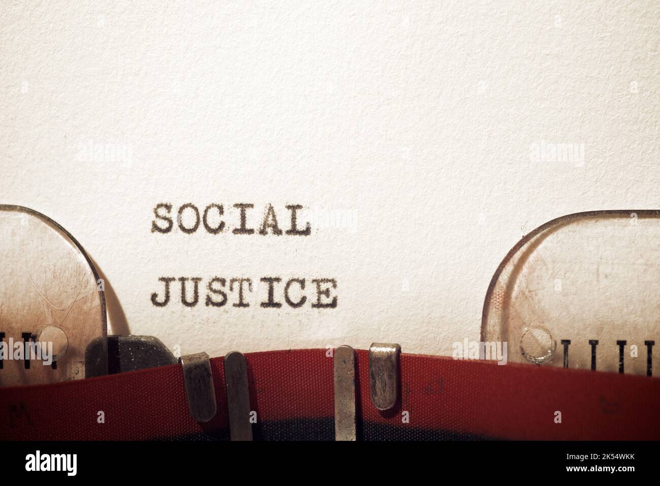 Social justice text written with a typewriter Stock Photo - Alamy
