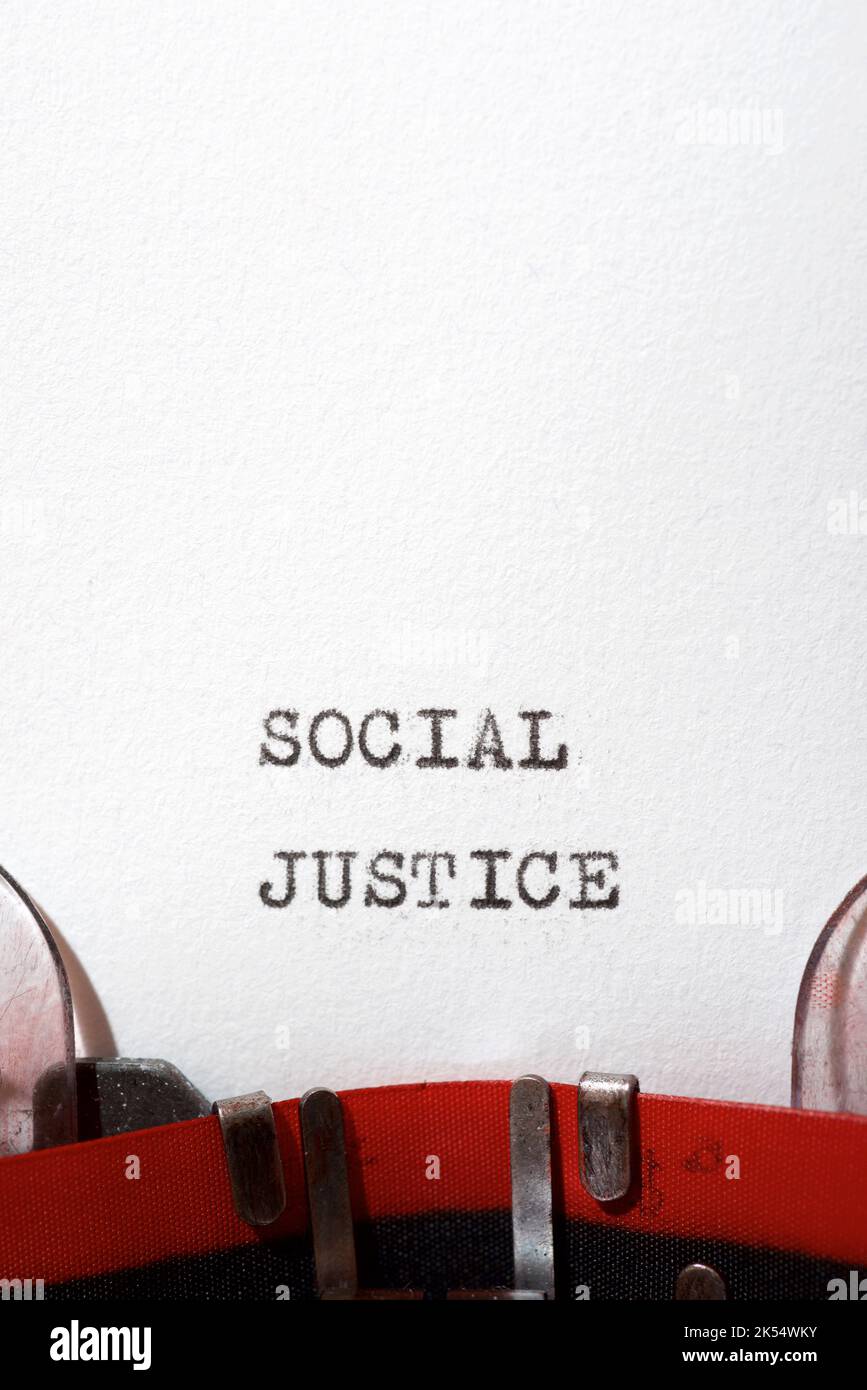 Social justice text written with a typewriter Stock Photo - Alamy
