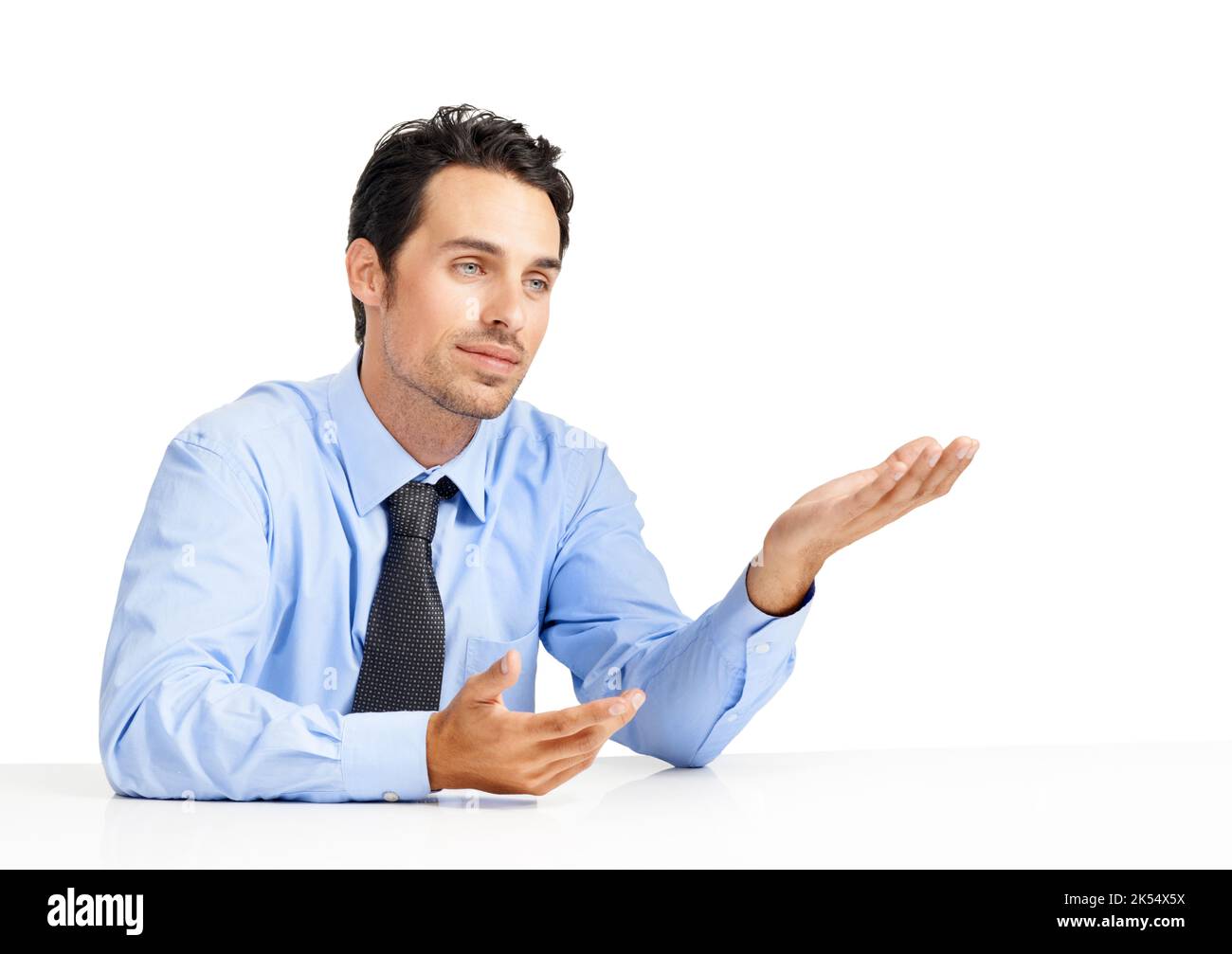 Explaining his business philosophy. A young business executive ...