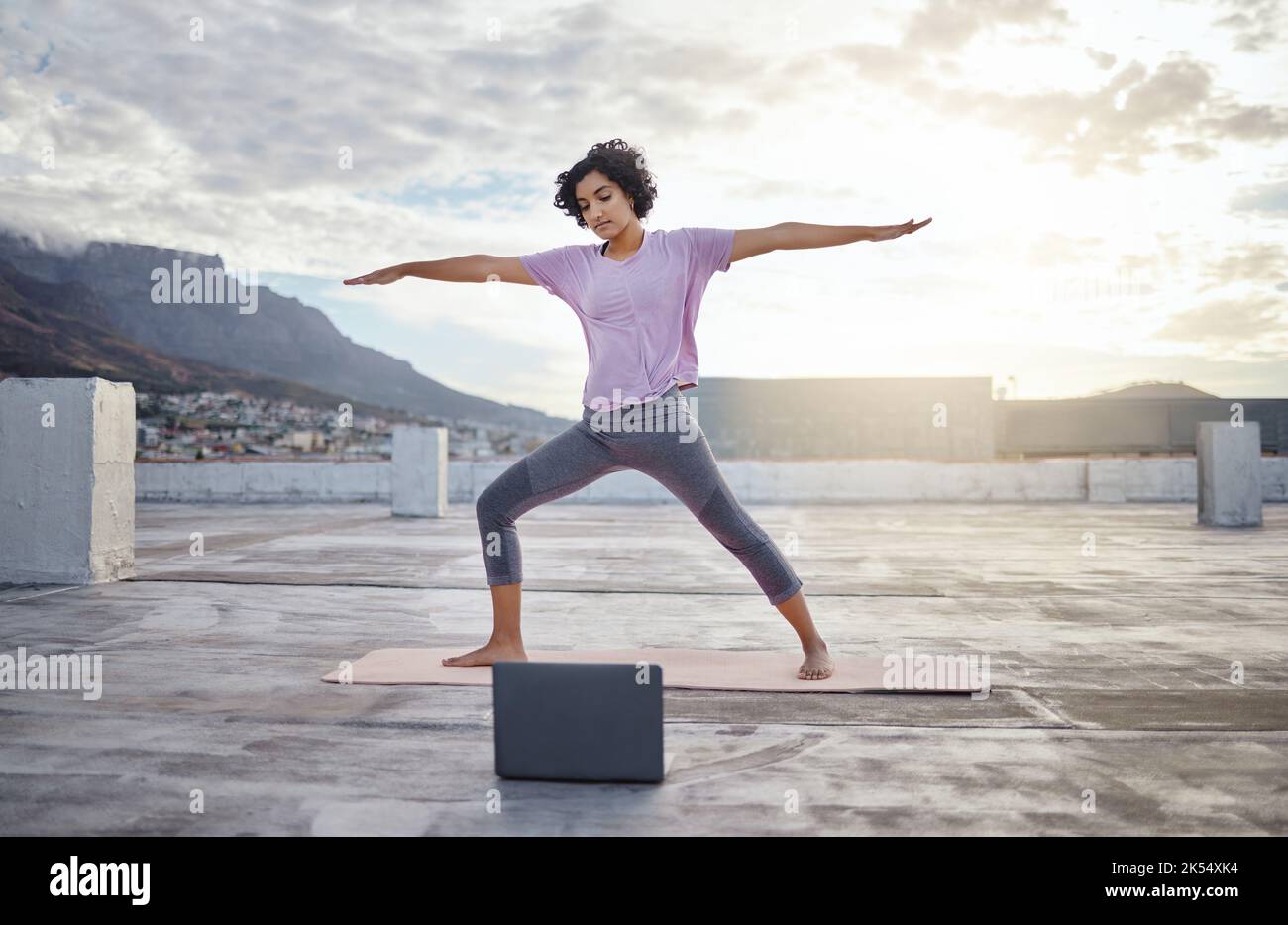 Yoga, laptop workout and woman outdoor training with stretching ...