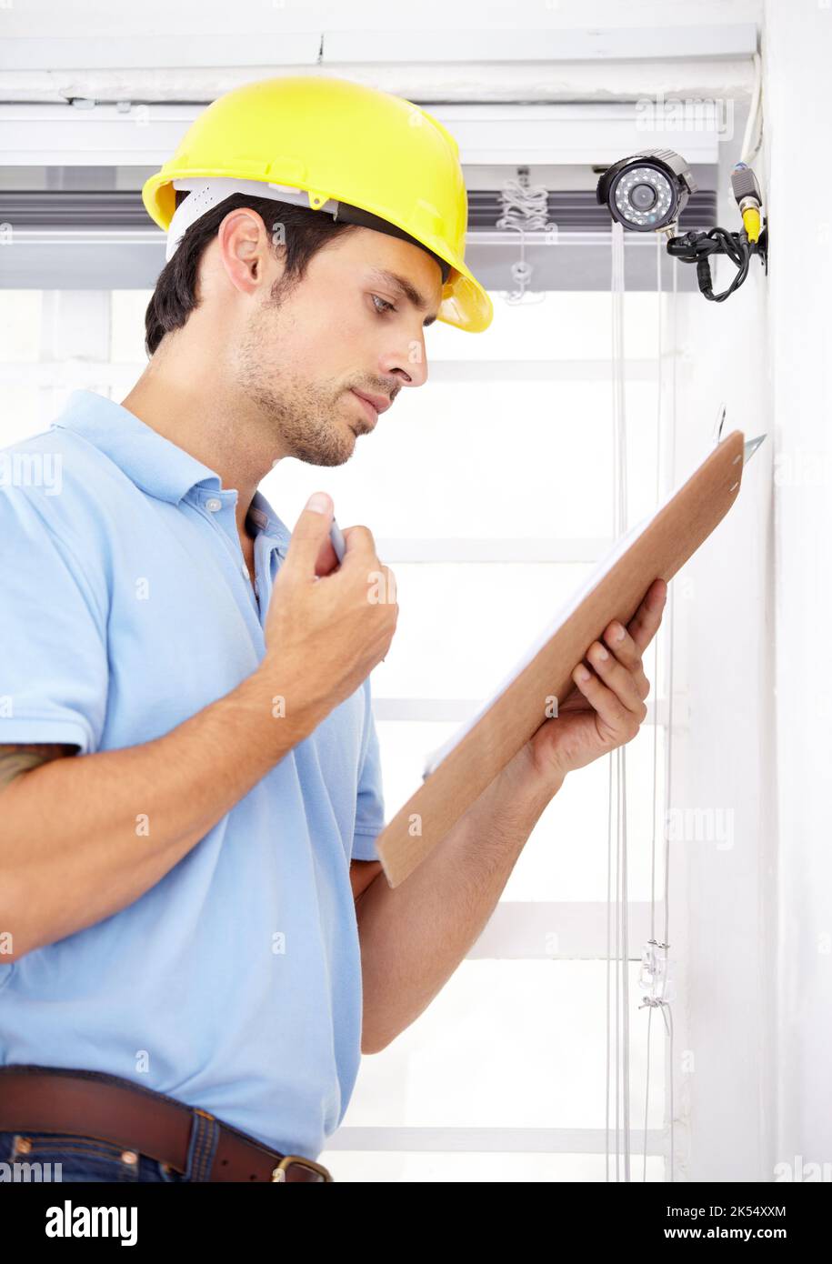 Just like his security camera, he doesnt miss a thing. a handsome young ...