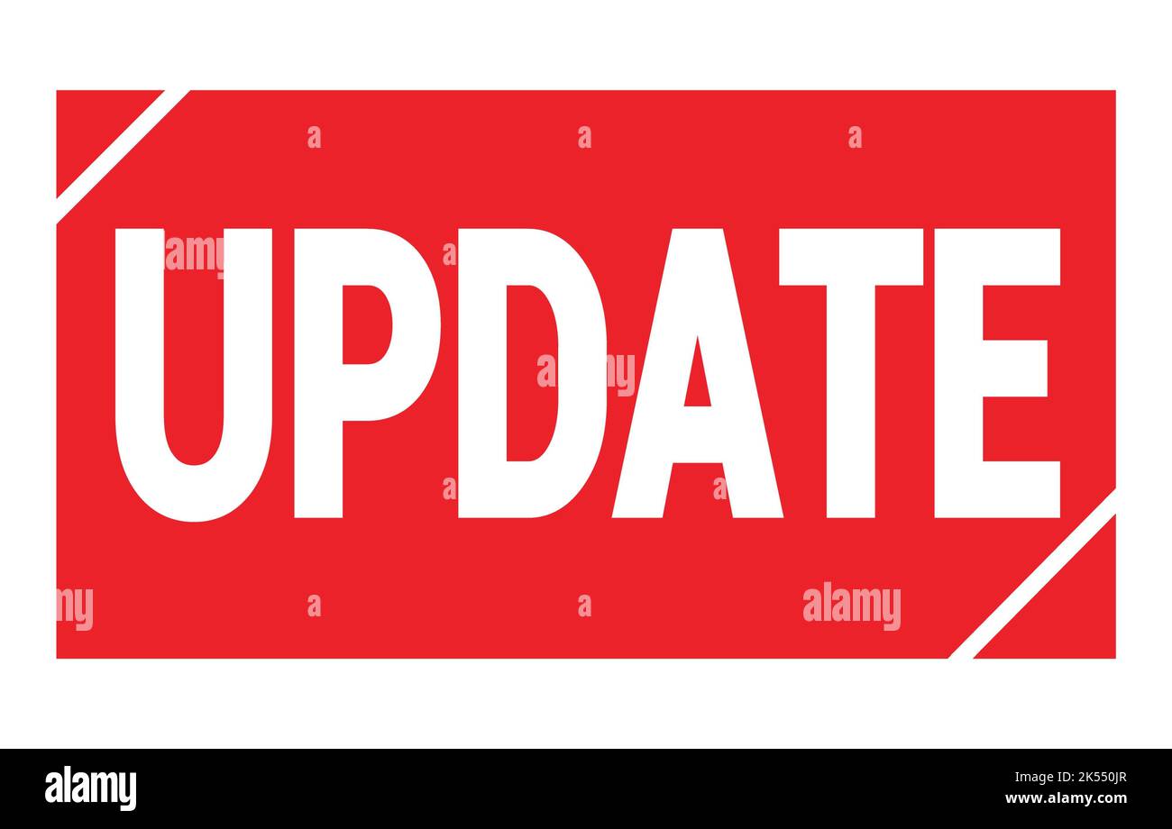 UPDATE text written on red rectangle stamp sign Stock Photo - Alamy