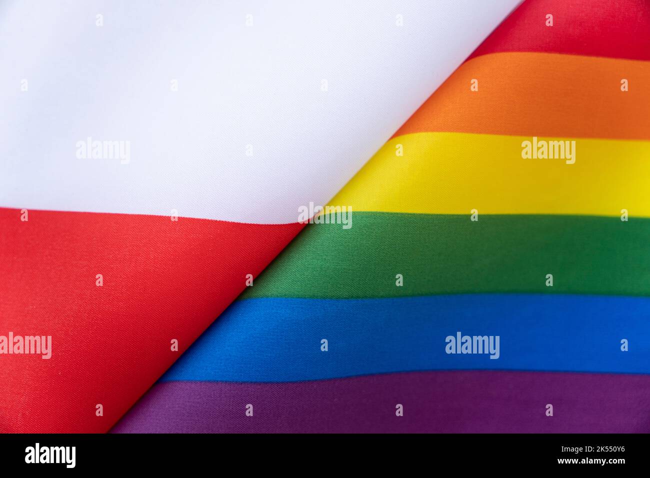 Poland flag and flag of LGBT community. The problem of the rights of ...