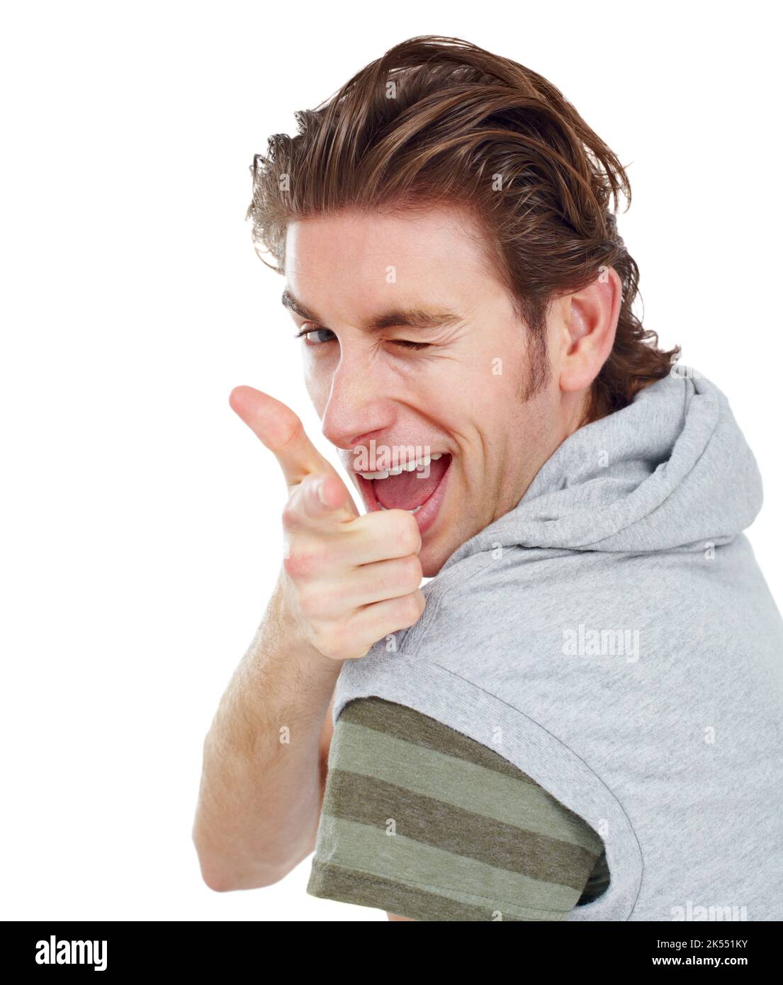 Ive got you. Handsome young man winking and pointing over his shoulder ...