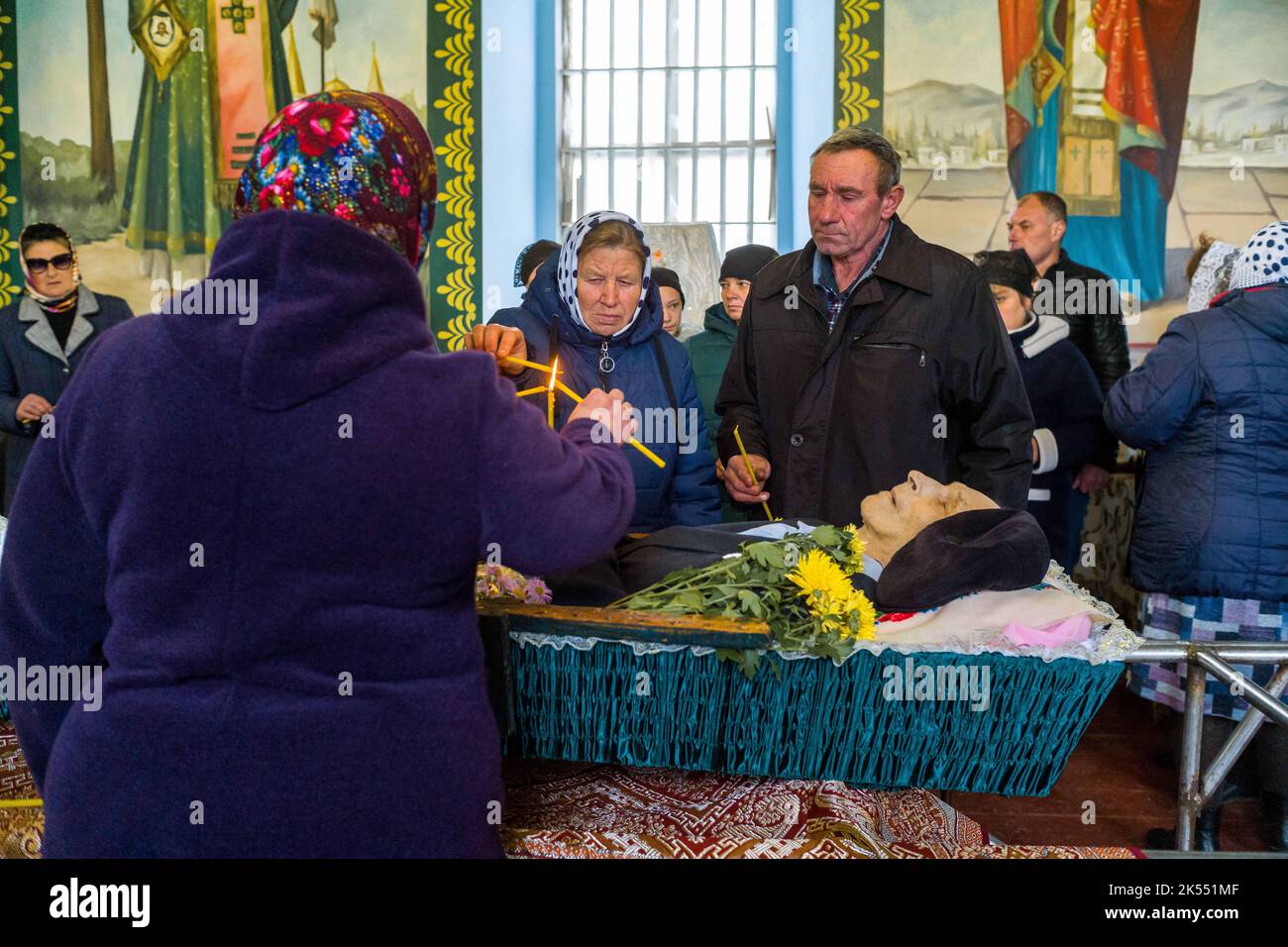 Ceremony with the priest pope in the church, the family embraces the ...