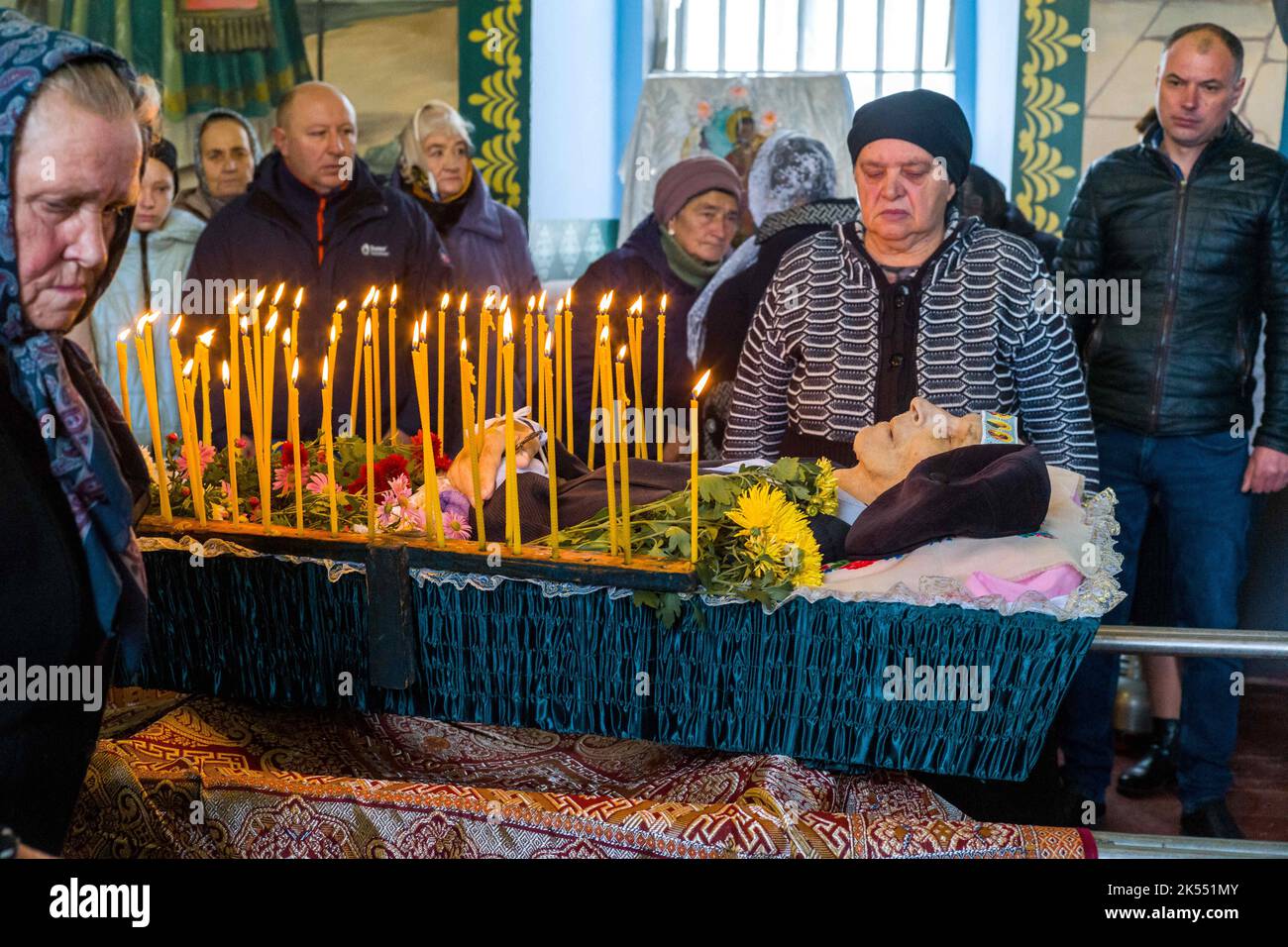 Ceremony with the priest pope in the church, the family embraces the ...