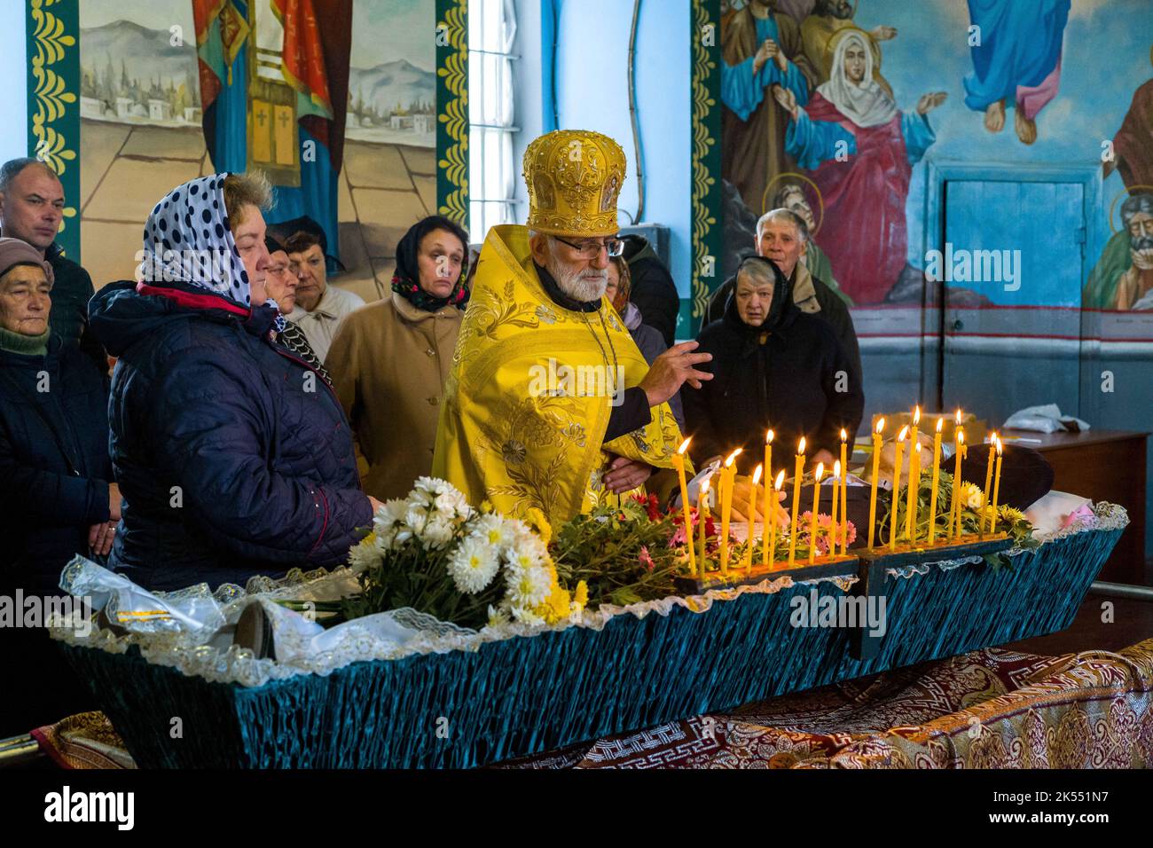 Ceremony with the priest pope in the church, the family embraces the ...