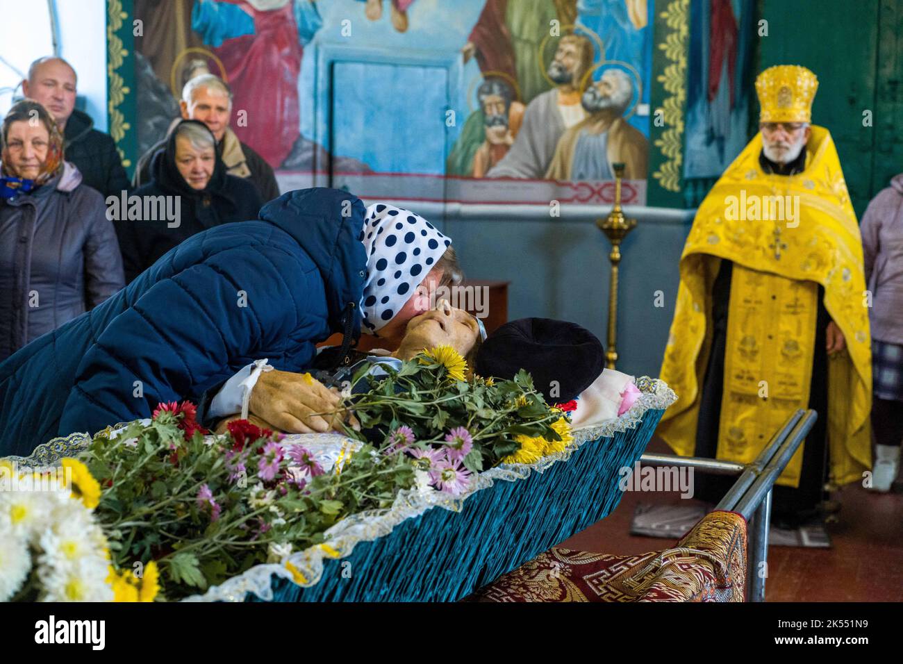 Ceremony with the priest pope in the church, the family embraces the ...