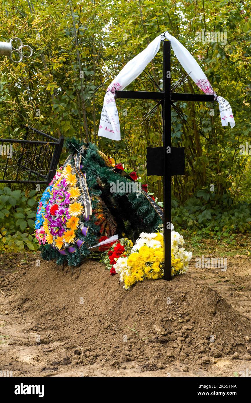 Ceremony and burial at the cemetery, a last goodbye to the deceased ...