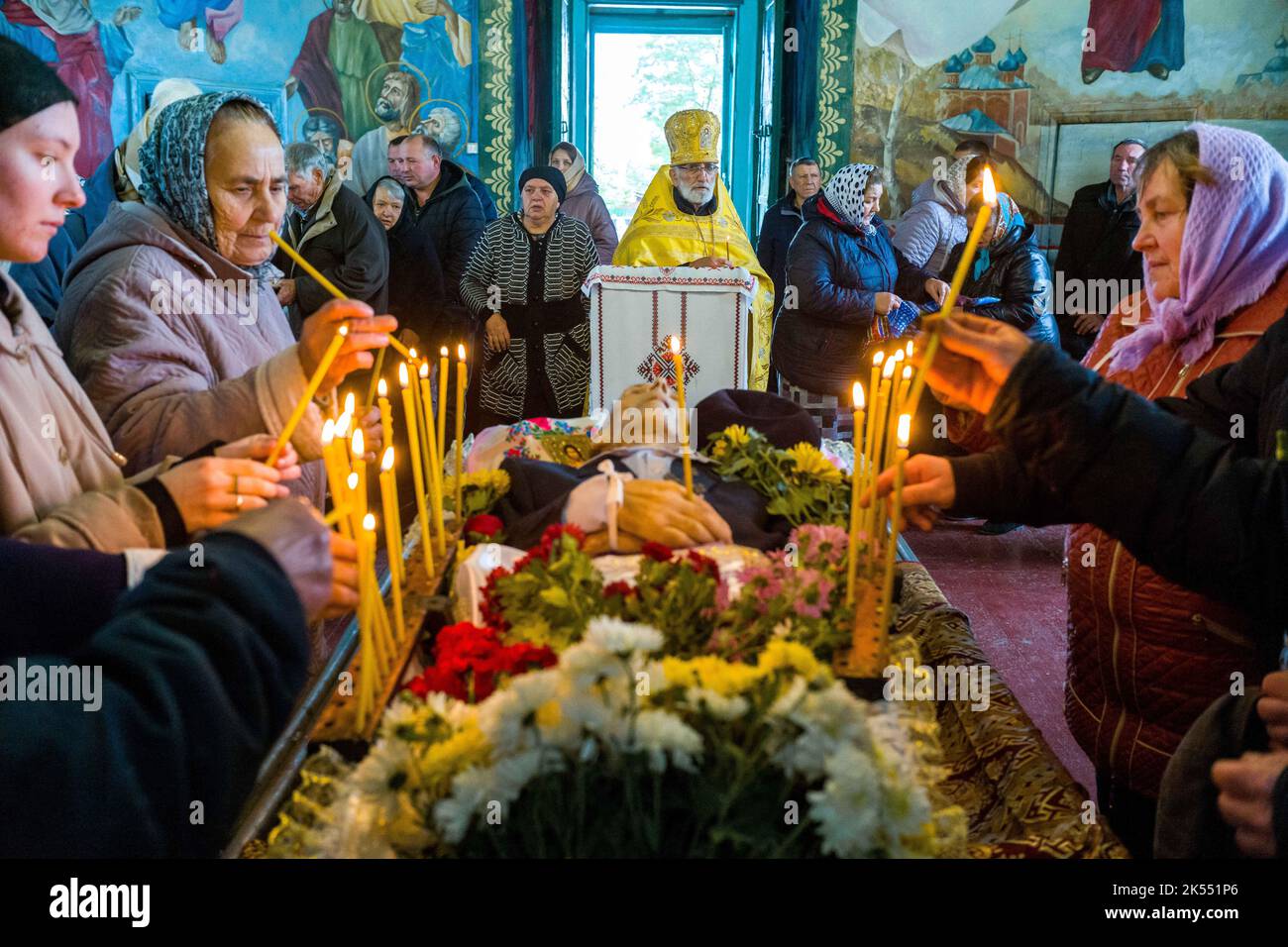 Ceremony with the priest pope in the church, the family embraces the ...