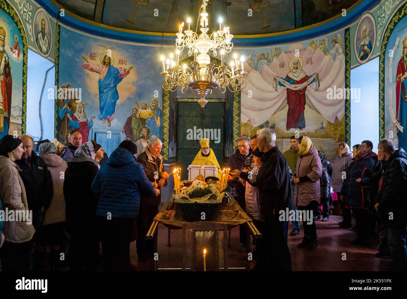 Ceremony with the priest pope in the church, the family embraces the ...