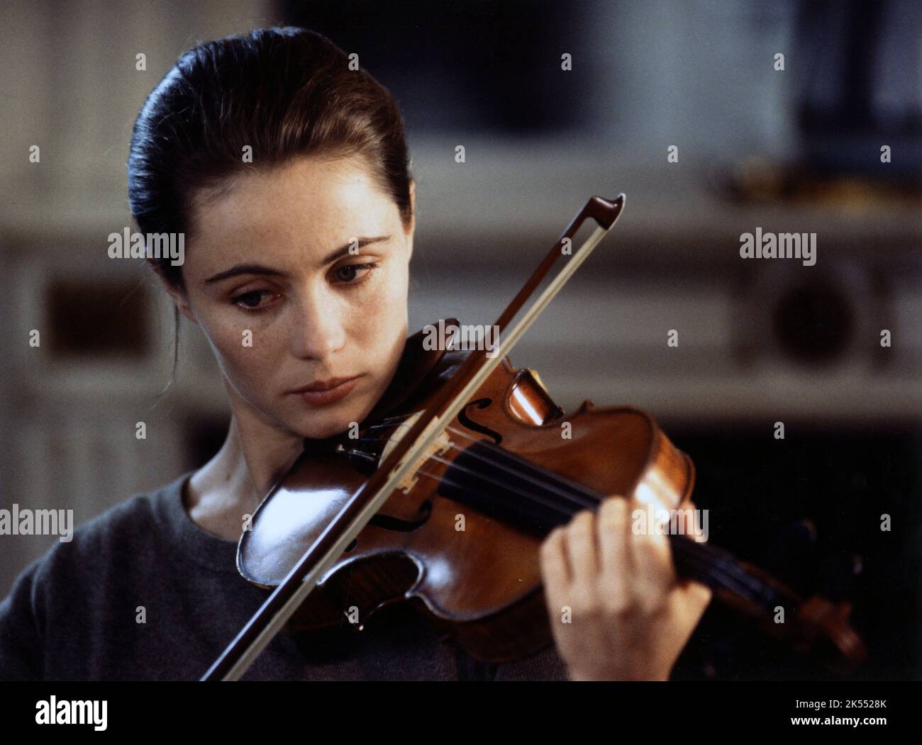 EMMANUELLE BEART in A HEART IN WINTER (1992) -Original title: UN COEUR ...