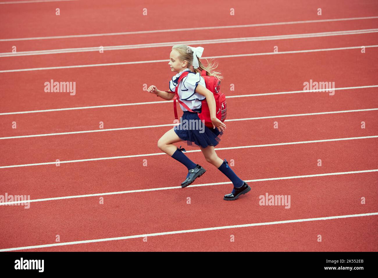 Start. Back to school, kids and education concept. Girl dressed in ...