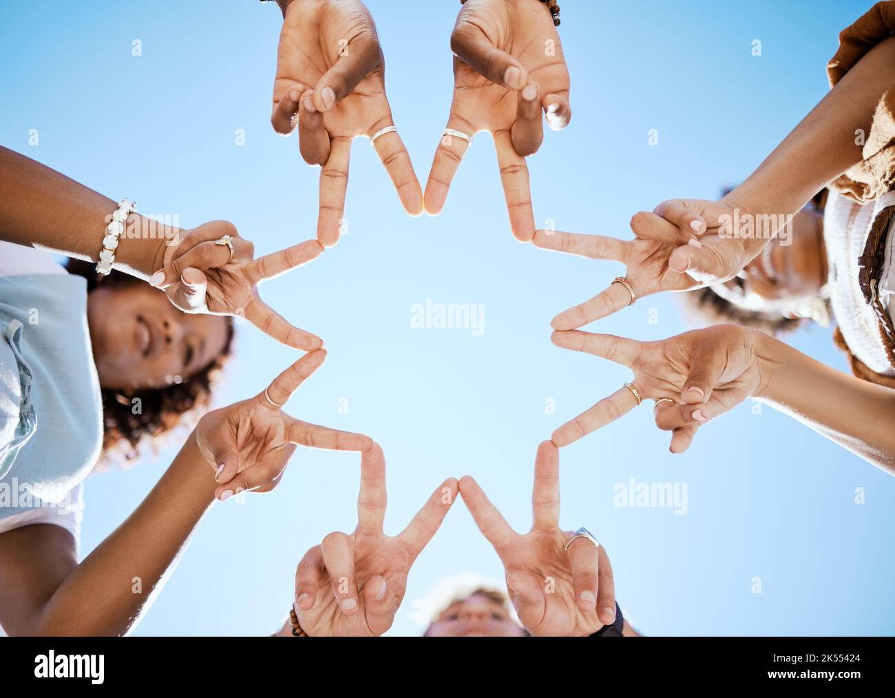 Friends, hands and star sign by volunteer group in support of ...