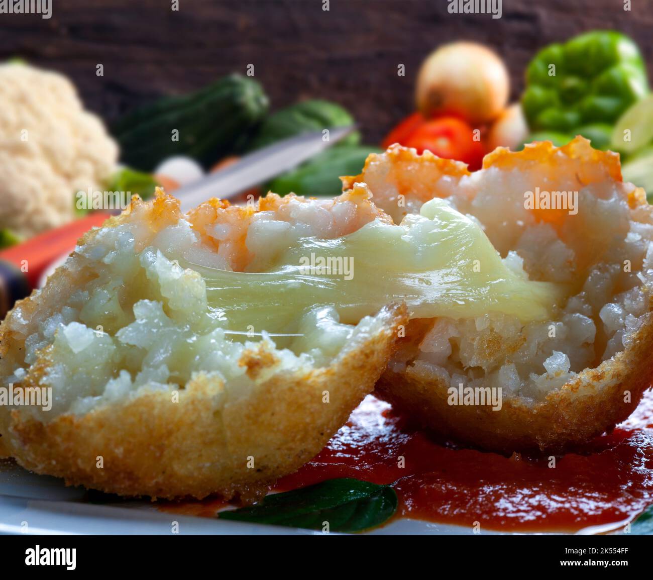 Fried rice balls. Traditional from Brazil where it is called Bolinho de ...