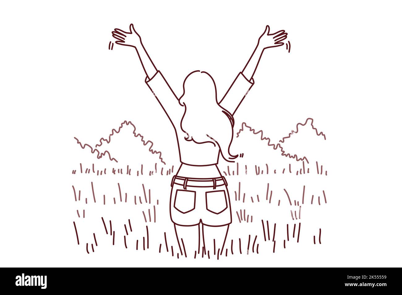 Back view of woman stand in field with hands raised excited with good ...