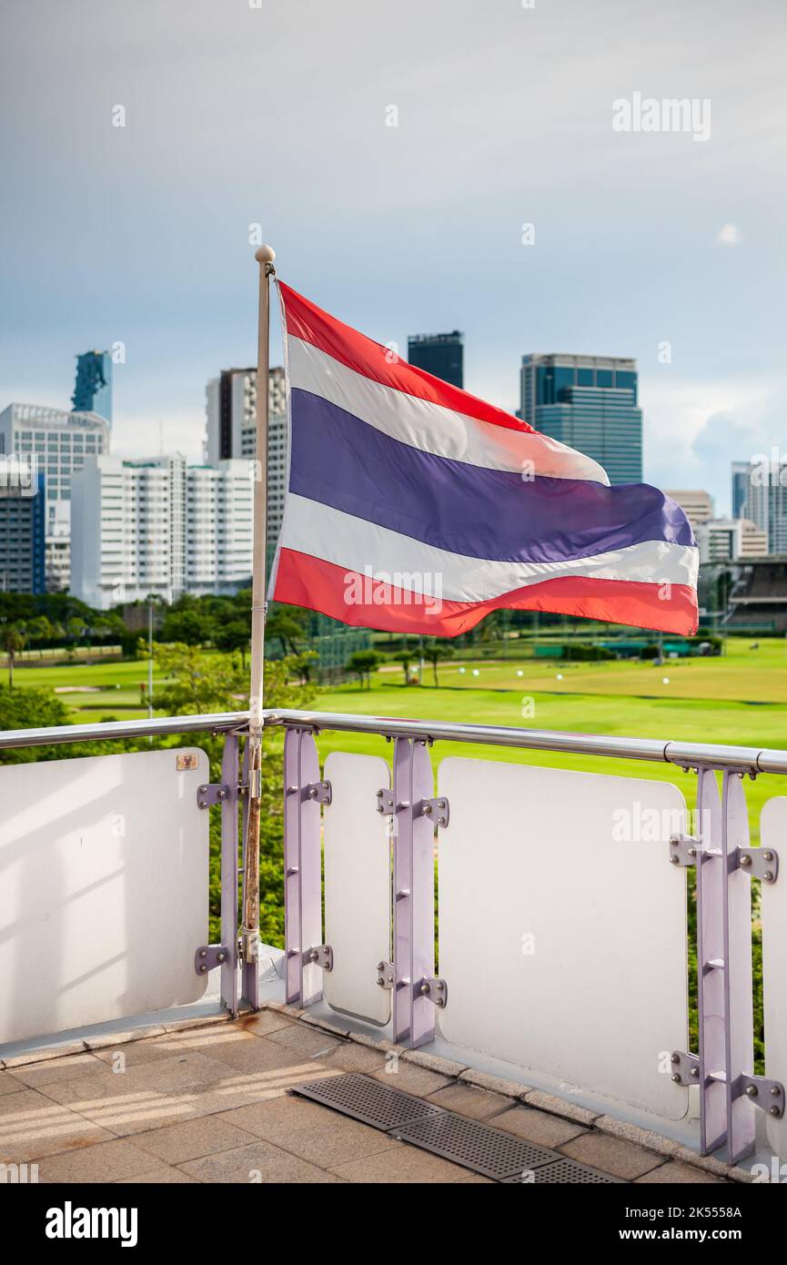The Thailand flag flies on the platform of the BTS mass transit sky ...