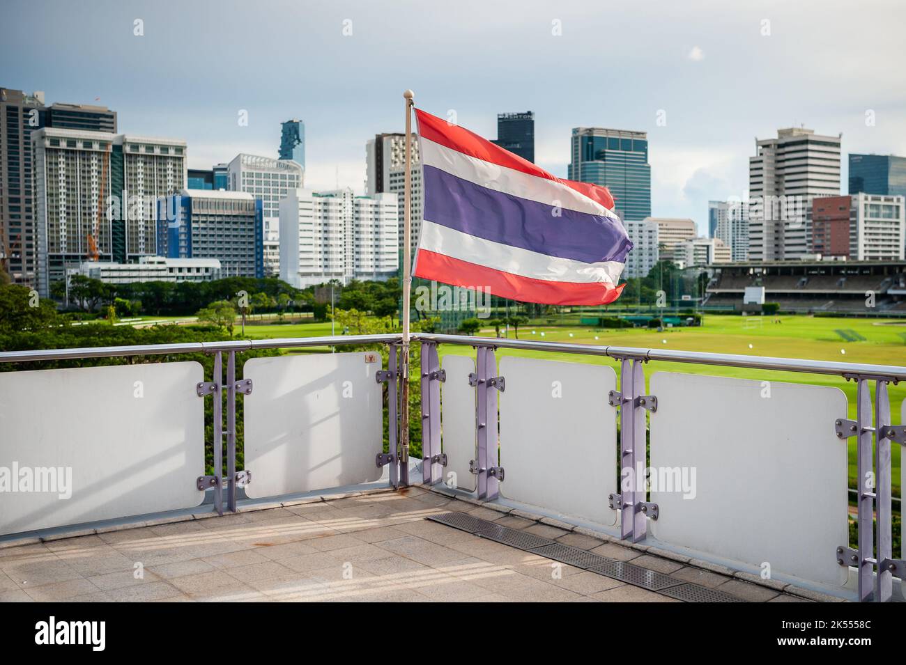 The Thailand flag flies on the platform of the BTS mass transit sky ...
