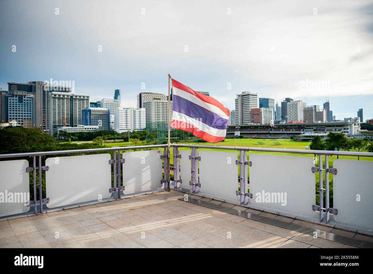 The Thailand flag flies on the platform of the BTS mass transit sky ...