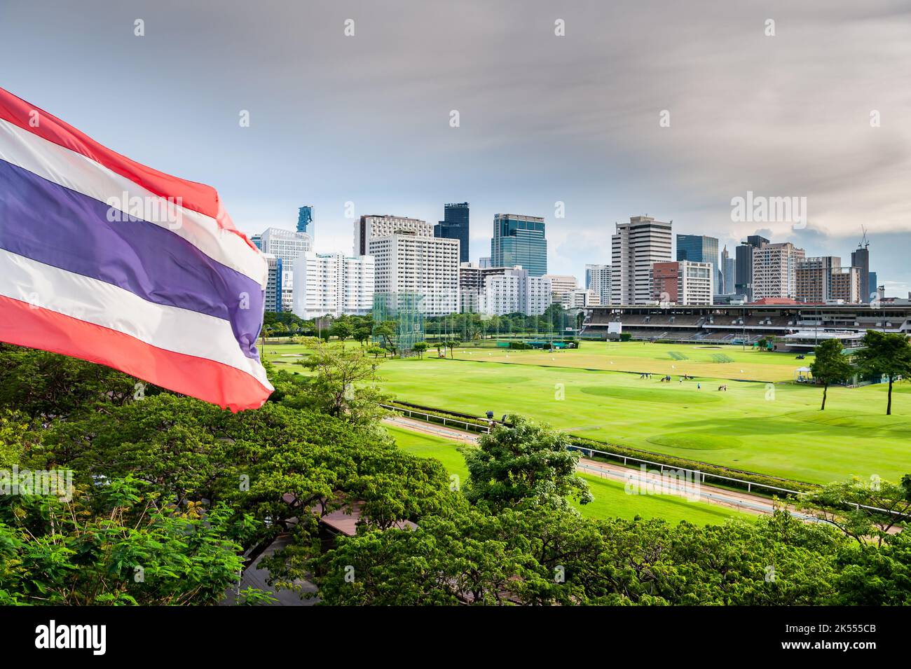 The Thailand flag flies on the platform of the BTS mass transit sky ...