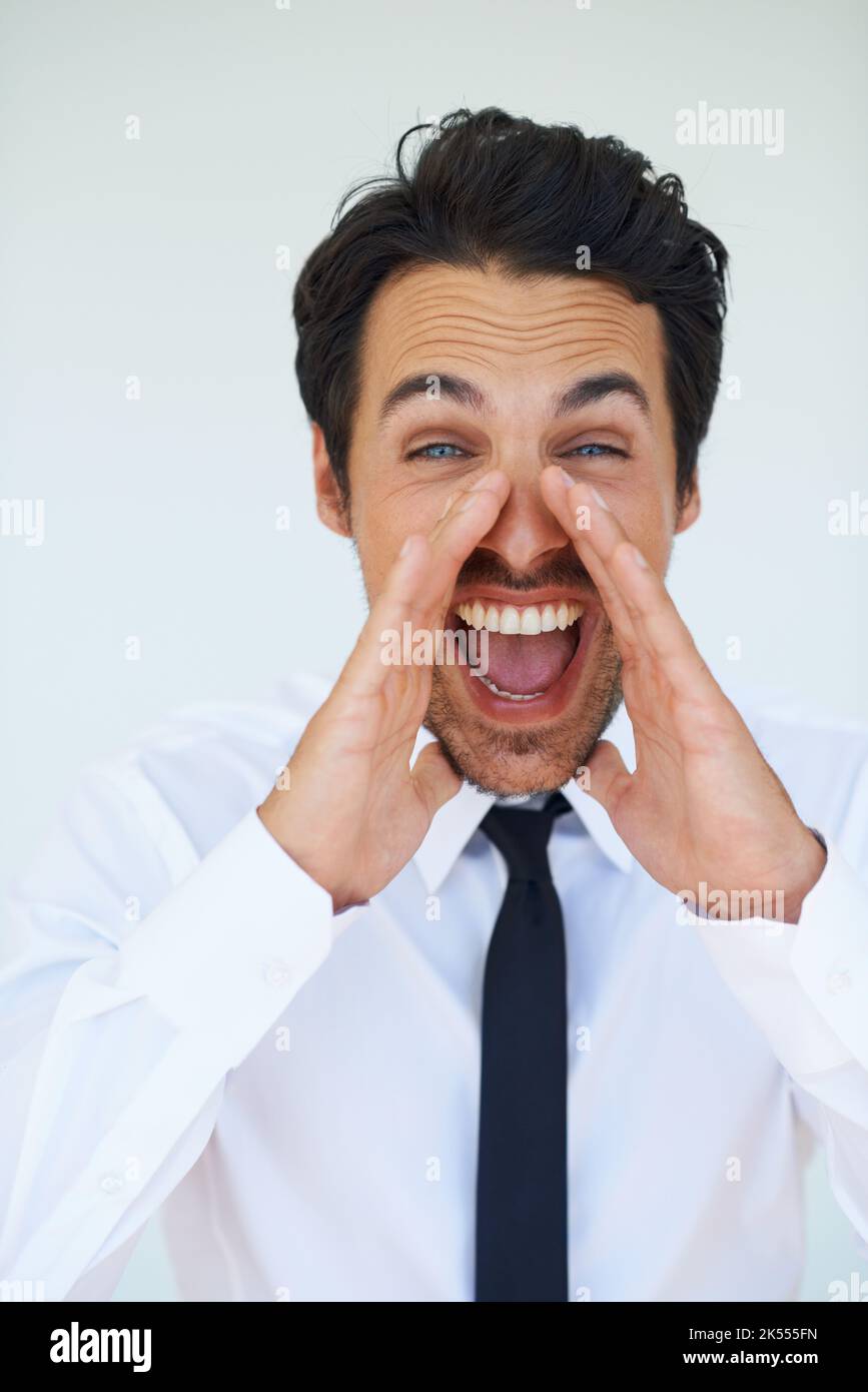 Making his voice heard in the business world. A handsome businessman ...