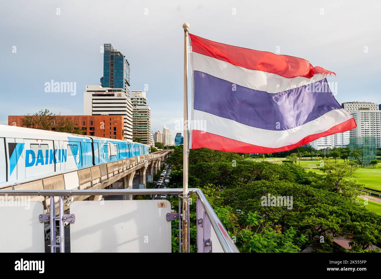 The Thailand flag flies on the platform of the BTS mass transit sky ...