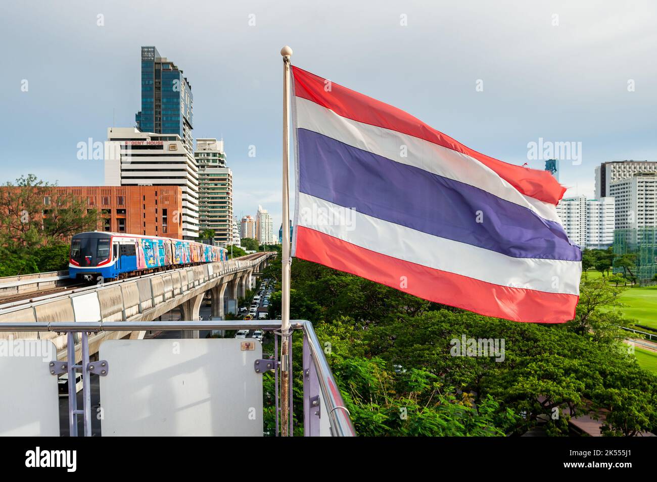 The Thailand flag flies on the platform of the BTS mass transit sky ...