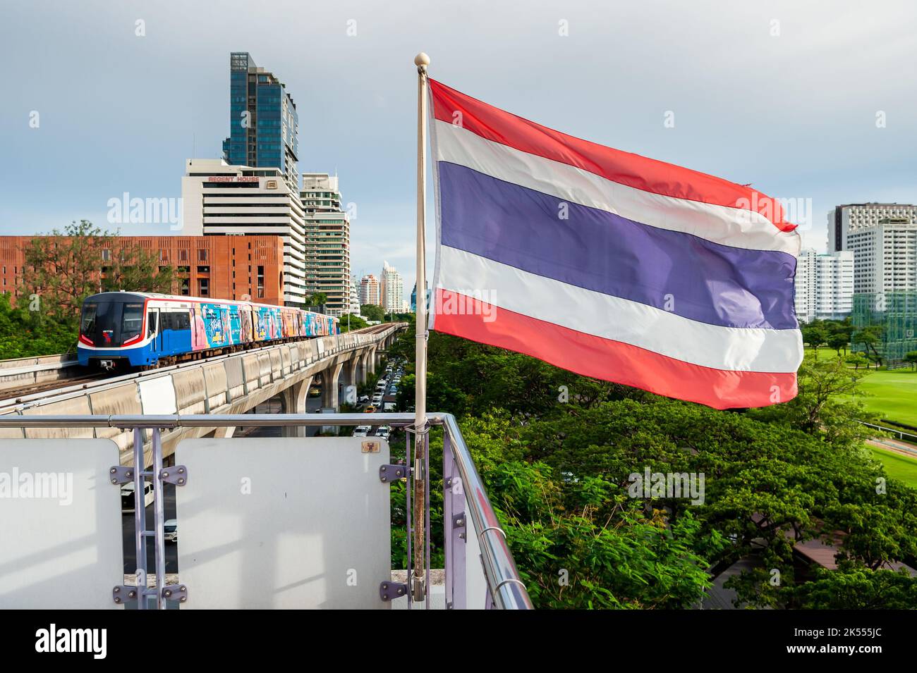 The Thailand flag flies on the platform of the BTS mass transit sky ...