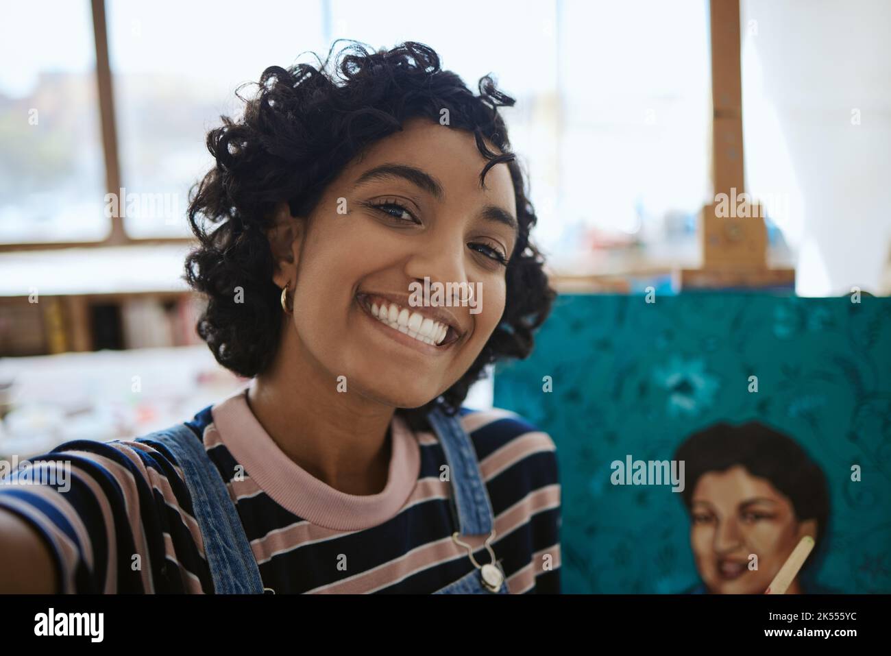 Art, selfie and Indian woman with painting on canvas while working in a ...