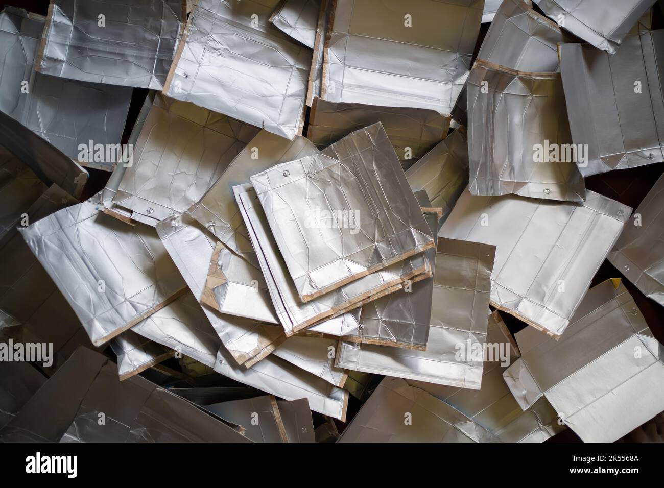 Milk carton packages collected for recycling Stock Photo - Alamy