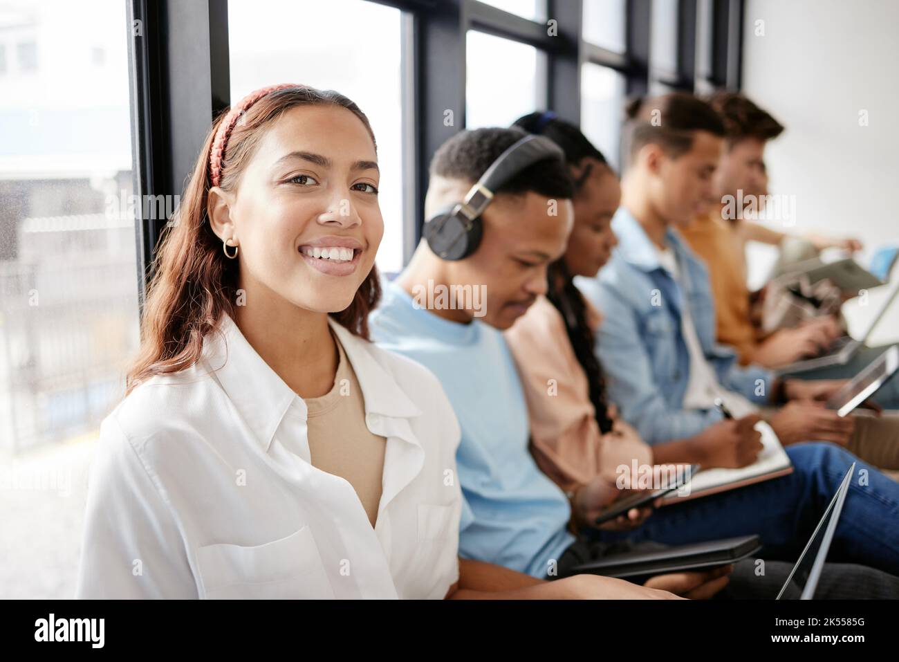 Studying, technology and students in university for digital or online ...