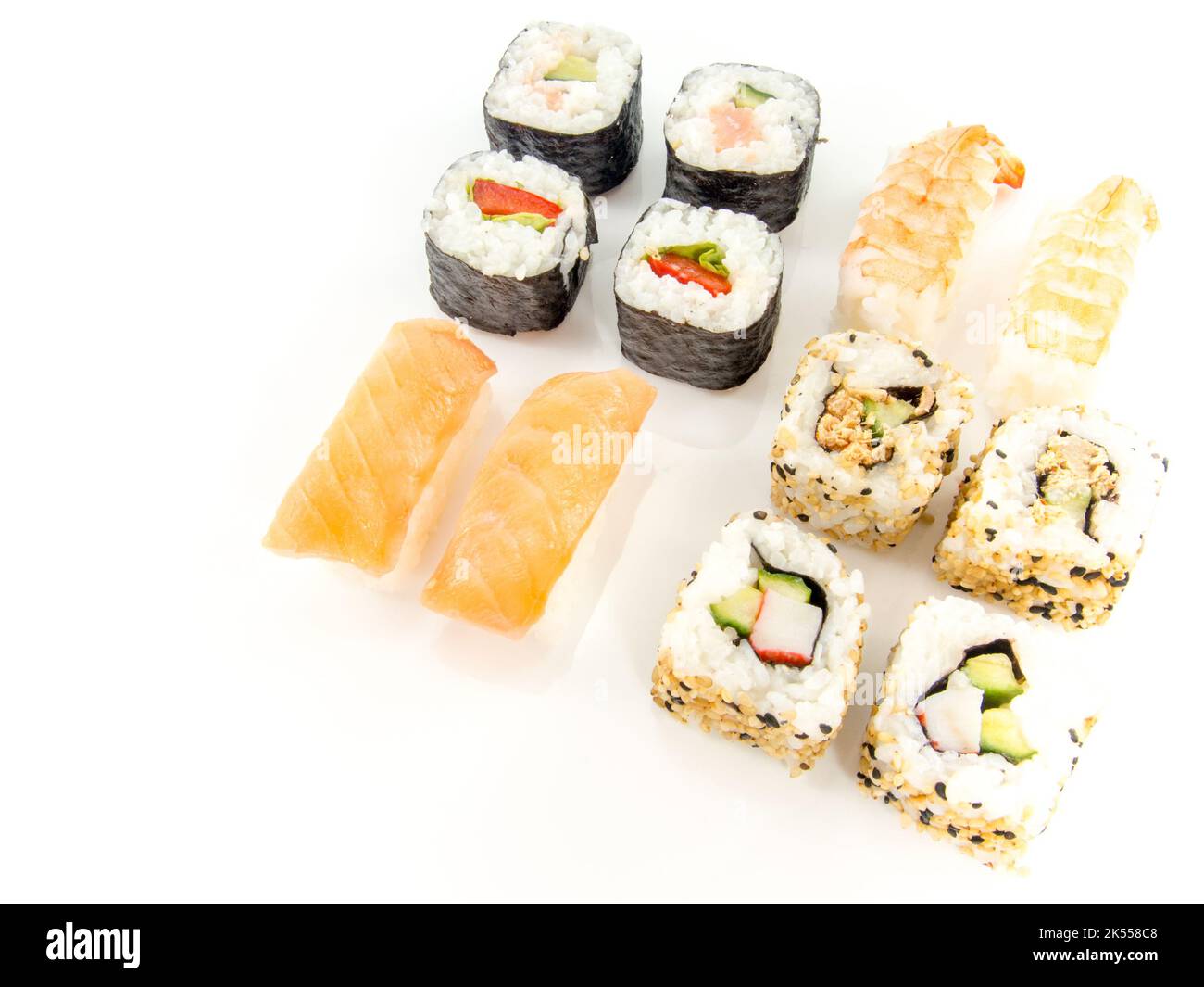 assorted delicious japanese traditional sushi over white Stock Photo ...