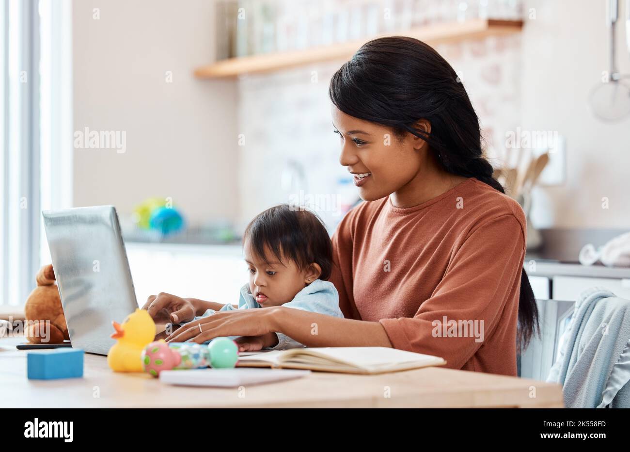 Down syndrome, laptop and mother for child development, education and ...