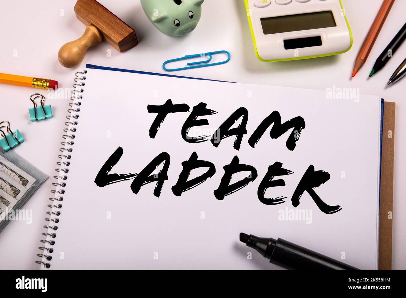 TEAM LADDER. White office desk with stationery Stock Photo - Alamy