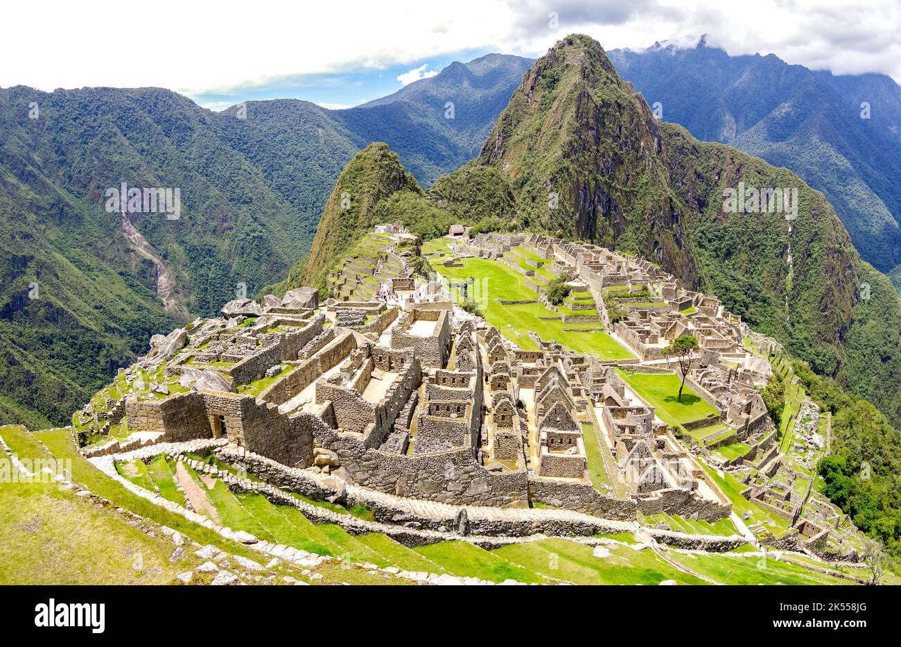 Panoramic view of Machu Picchu lost city at archaeological ruins site ...