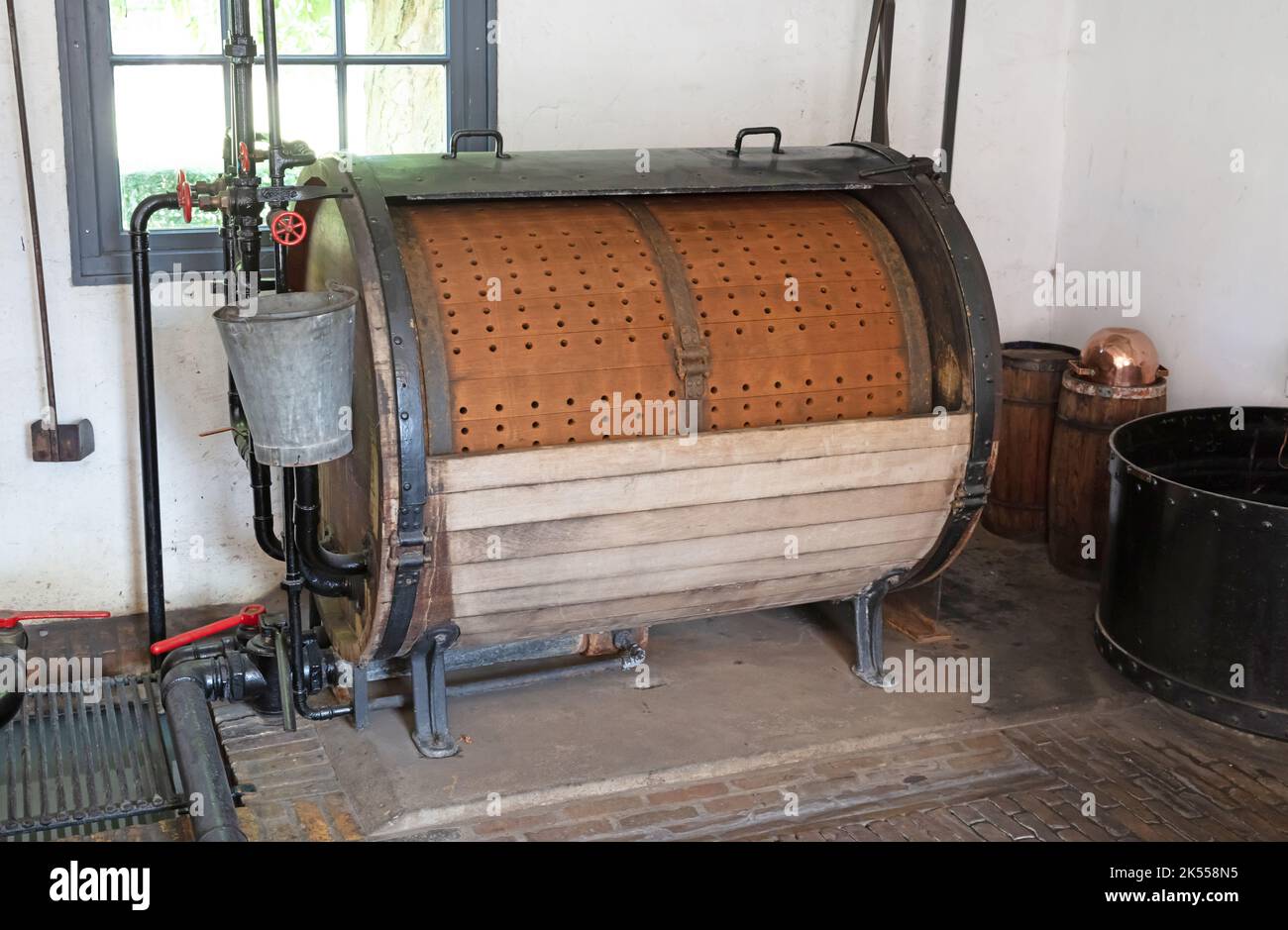 Old machine that is used to wash clothes from the old days, in use ...