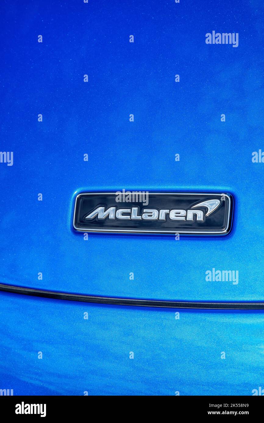 McLaren emblem on blue 765LT Stock Photo - Alamy