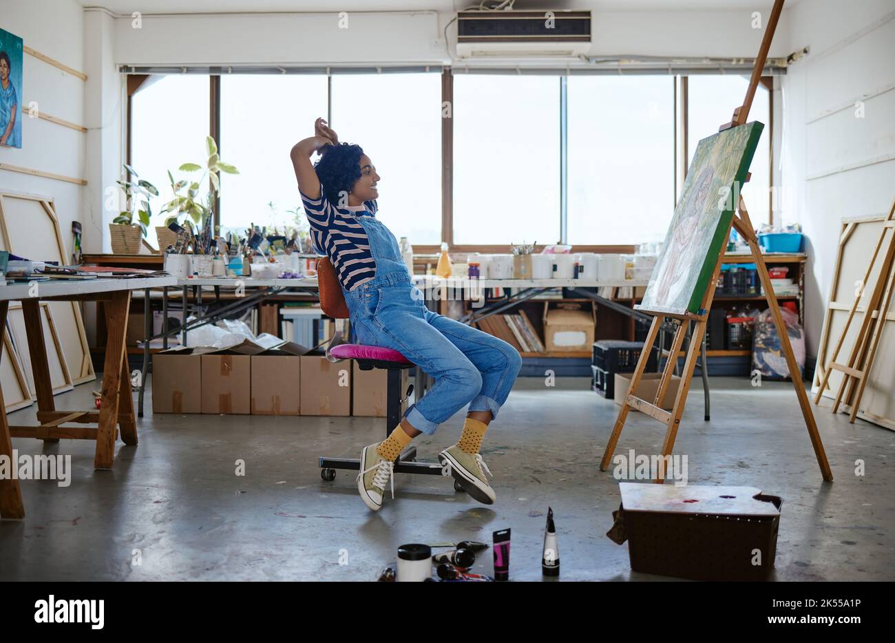 Creative woman, success and art painting in studio workshop with ...