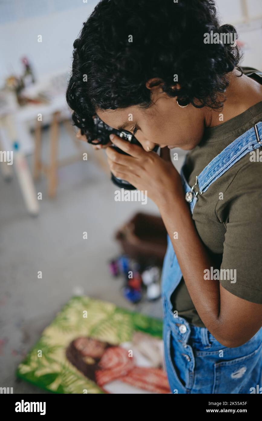 Woman artist with camera, create for digital art to post and sell ...