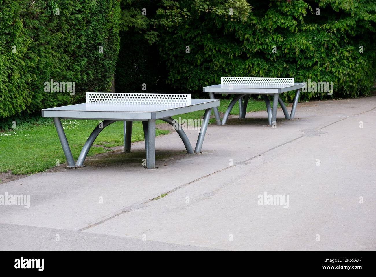 All weather table tennis tables in a park with no one playing on them ...