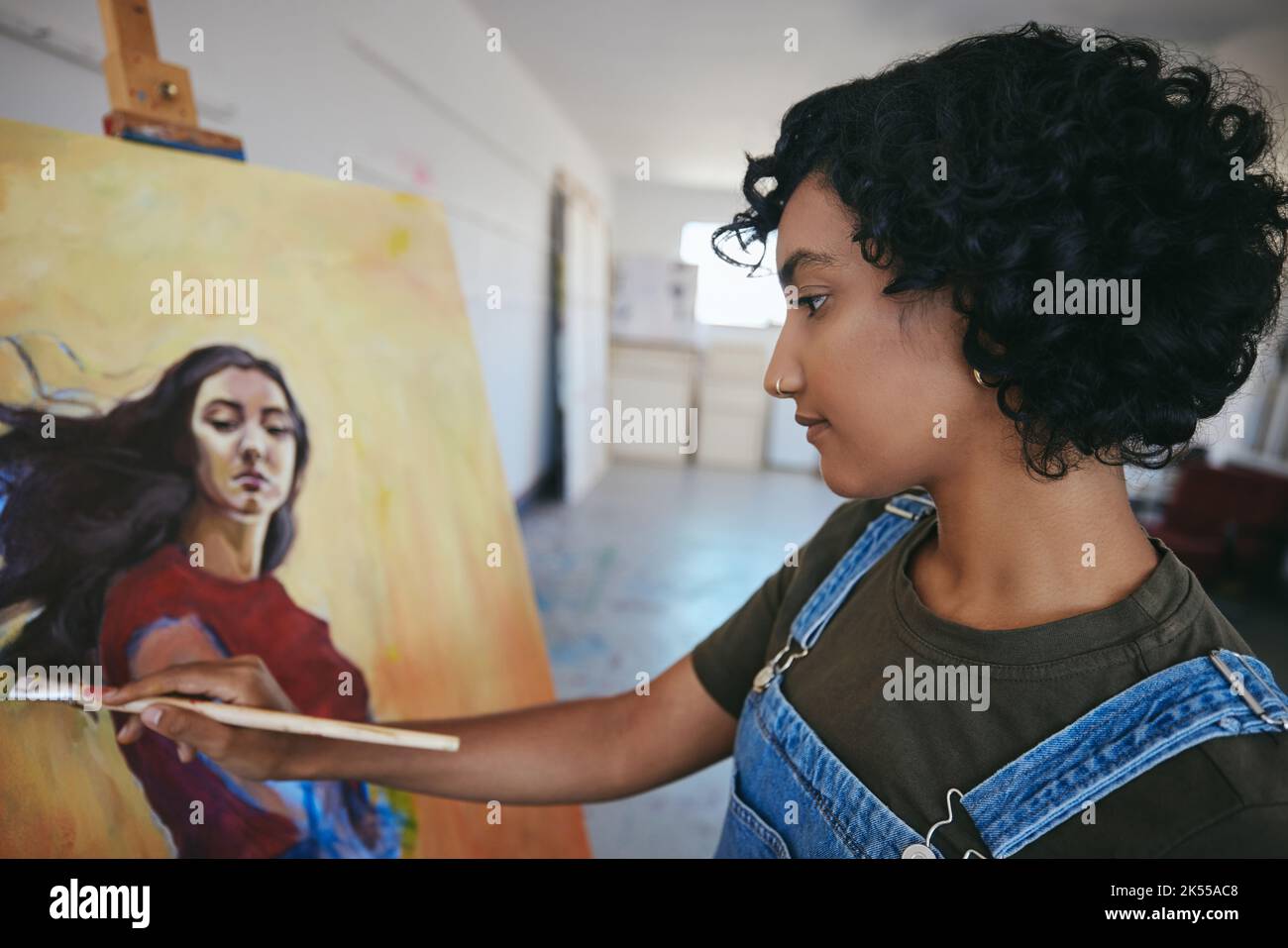 Painter, artist and woman at work on painting in studio for exhibition ...