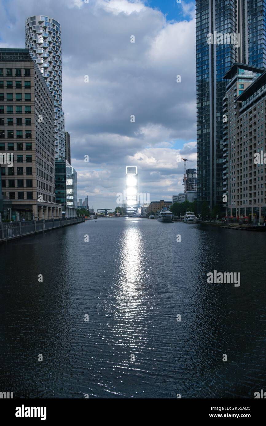Bright refelction as the setting sun hits a nearby building refelcting ...