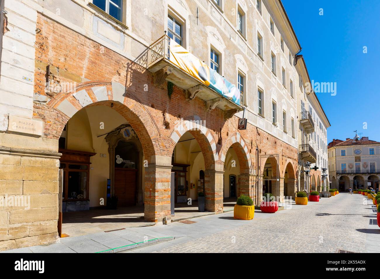 Piazza Maggiore in Mondovi town. Medieval buildings with frescoed brick ...
