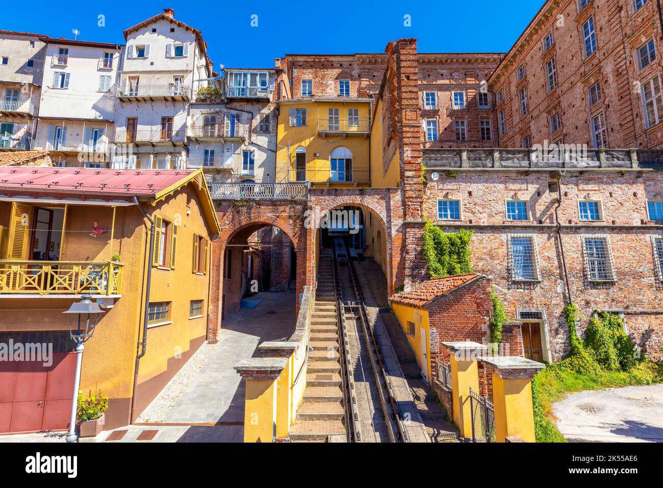 Funicular train leading up Piazza Maggiore on the Monte Regale hill ...
