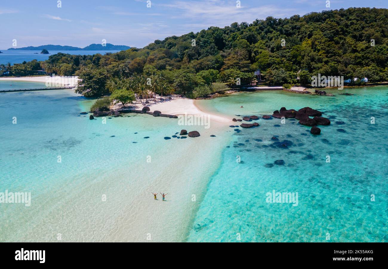 Man and women on a tropical beach in Thailand, Koh Kham Thailand Trat ...