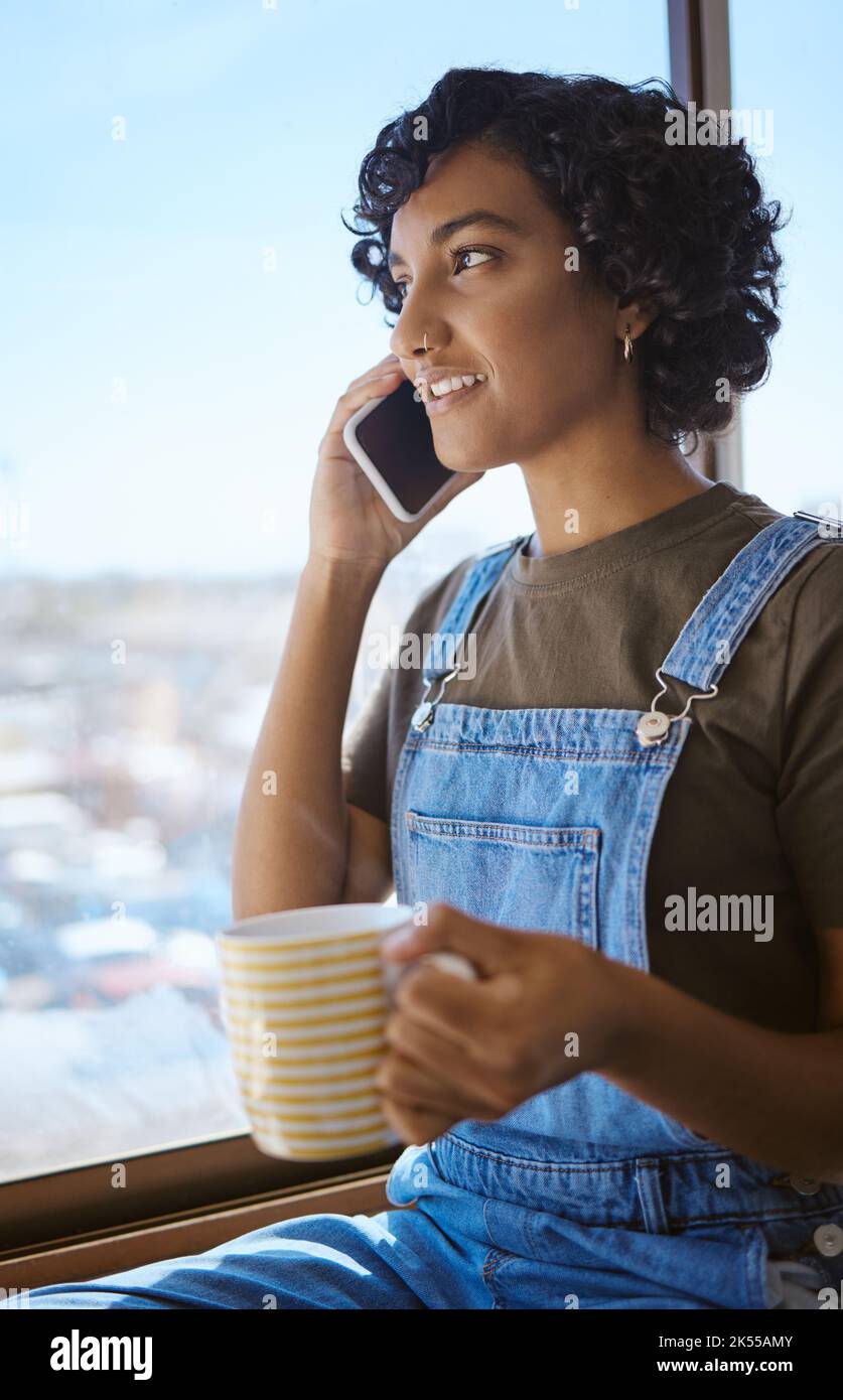 Phone call, coffee and woman in communication in home by window ...